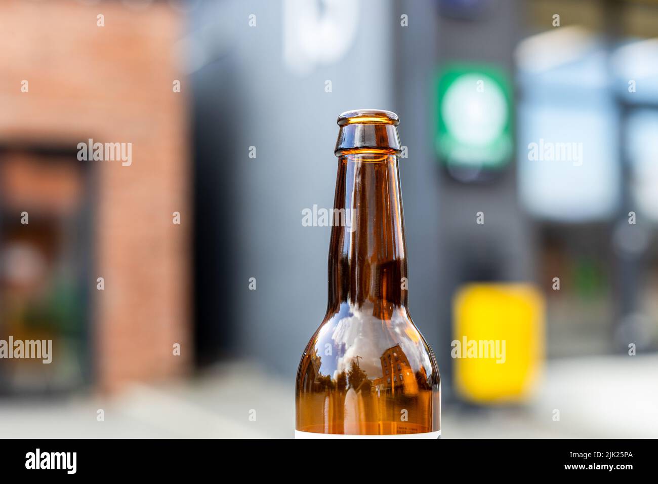 open brown glass bottle close up outdoors in summer evening Stock Photo ...