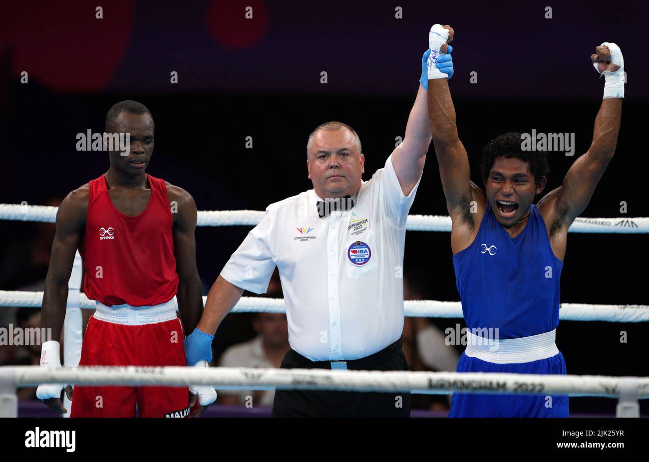 Malawi's Elias Bonzo and Papua New Guinea's John Ume during the Men’s ...