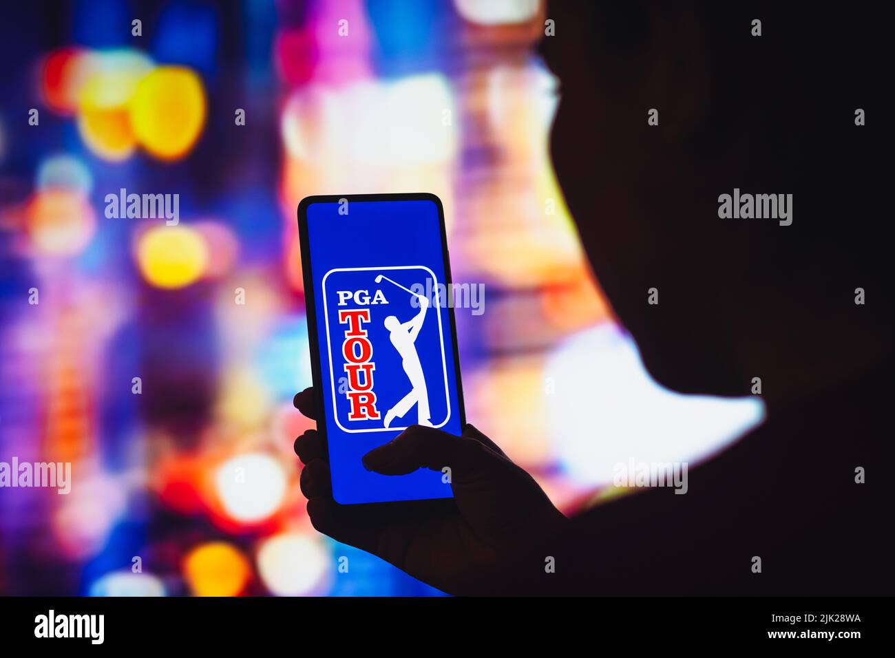 In this photo illustration, the PGA Tour logo is displayed on a ...