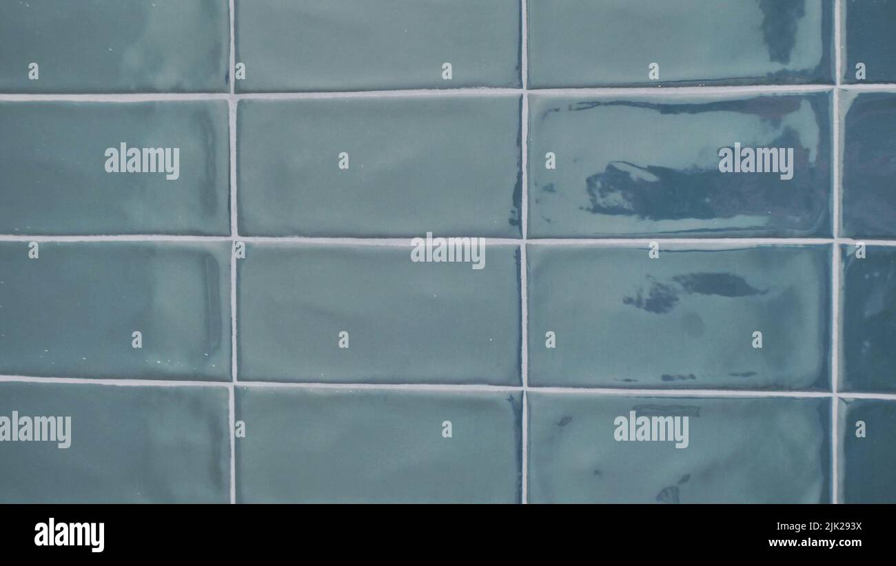A blue tiled background with relatively small tiles Stock Photo - Alamy