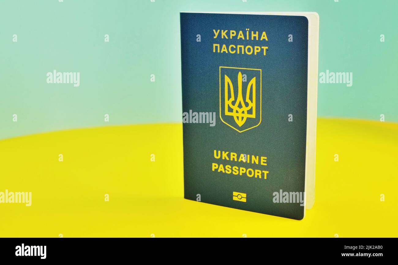 Ukrainian international biometric passport and bag for travel close up ...