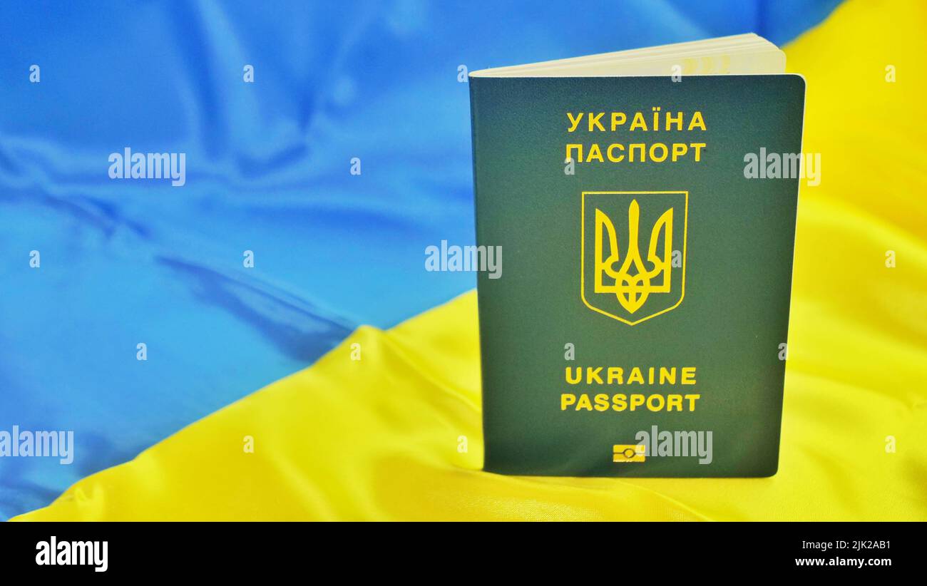 Ukrainian international biometric passport and bag for travel close up ...