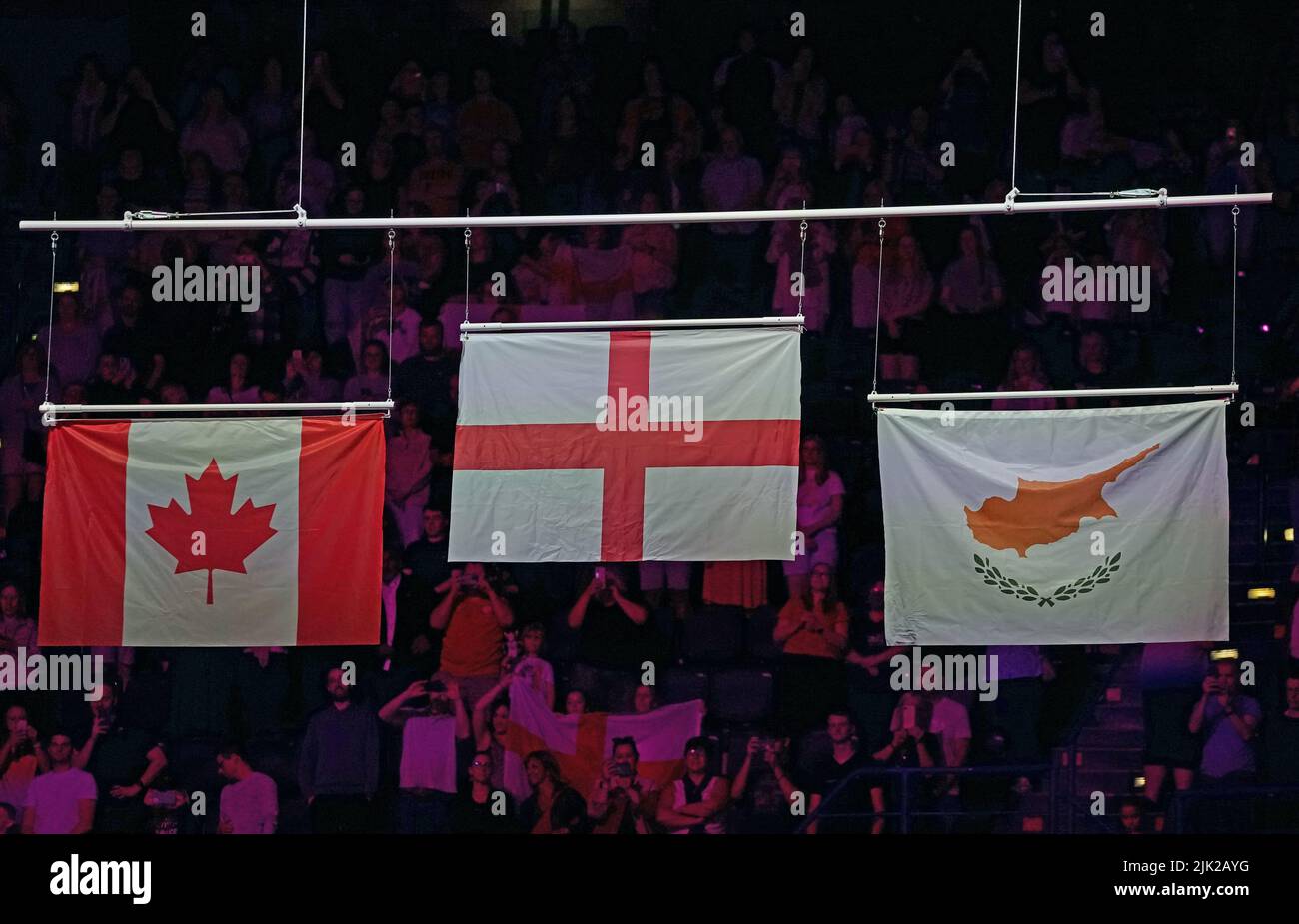 The flags of Canada, England and Cyprus are raised after the Men's Team ...