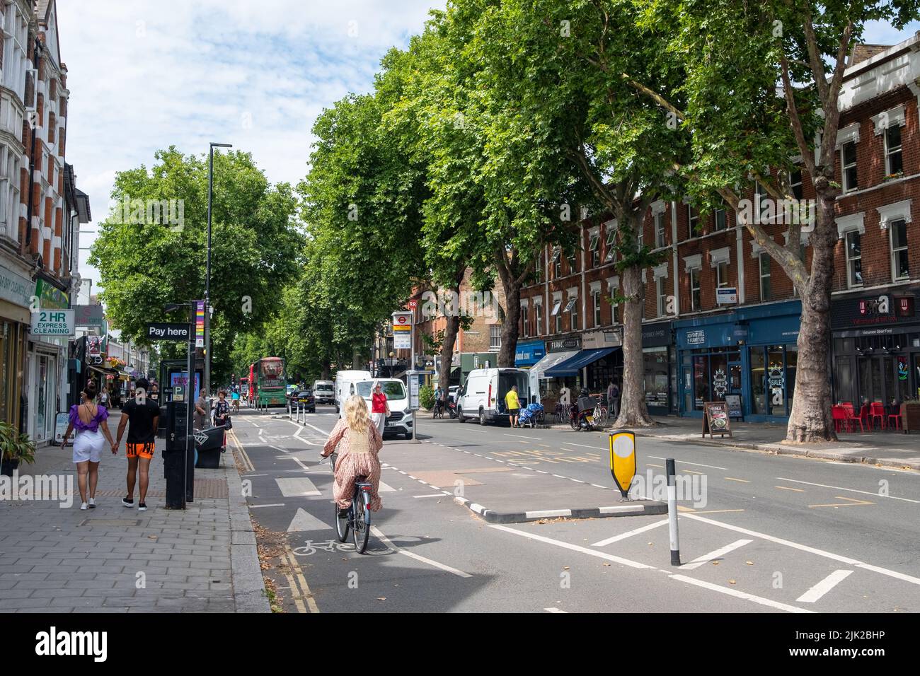 London- July 2022: Chiswick High Road summer scene, a long street of ...