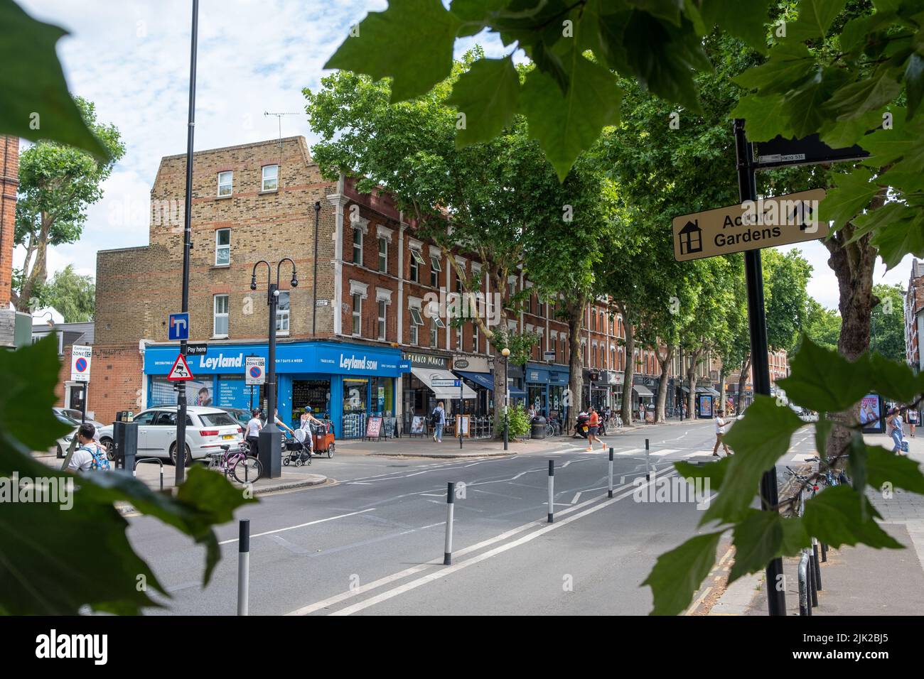 London- July 2022: Chiswick High Road summer scene, a long street of ...