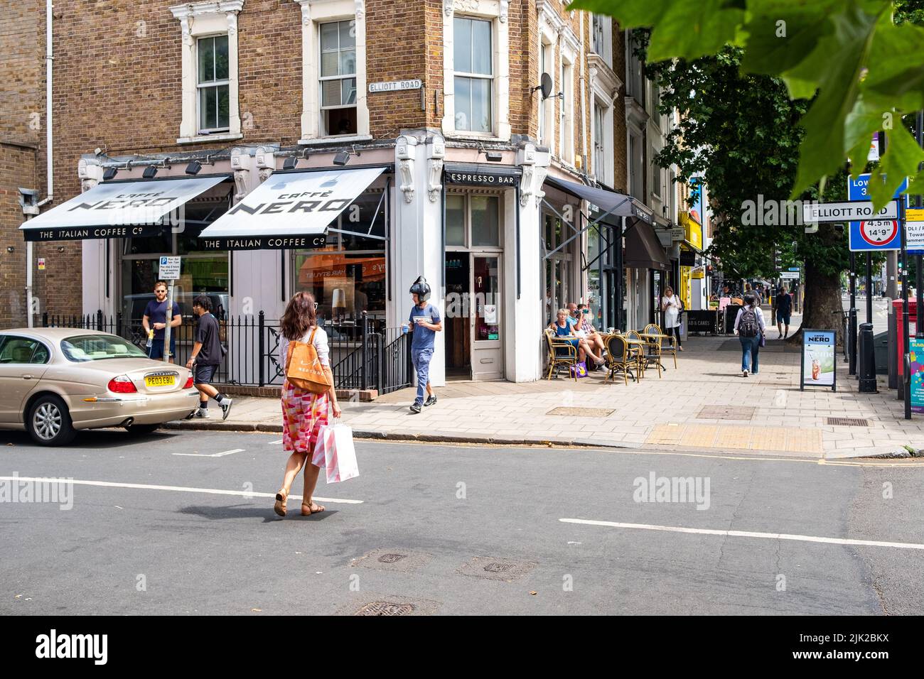 London- July 2022: Chiswick High Road summer scene, a long street of ...