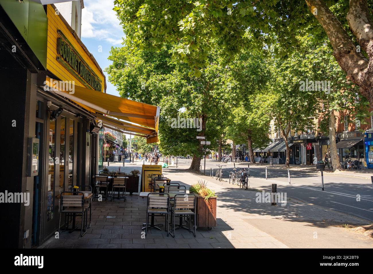 London- July 2022: Chiswick High Road summer scene, a long street of ...