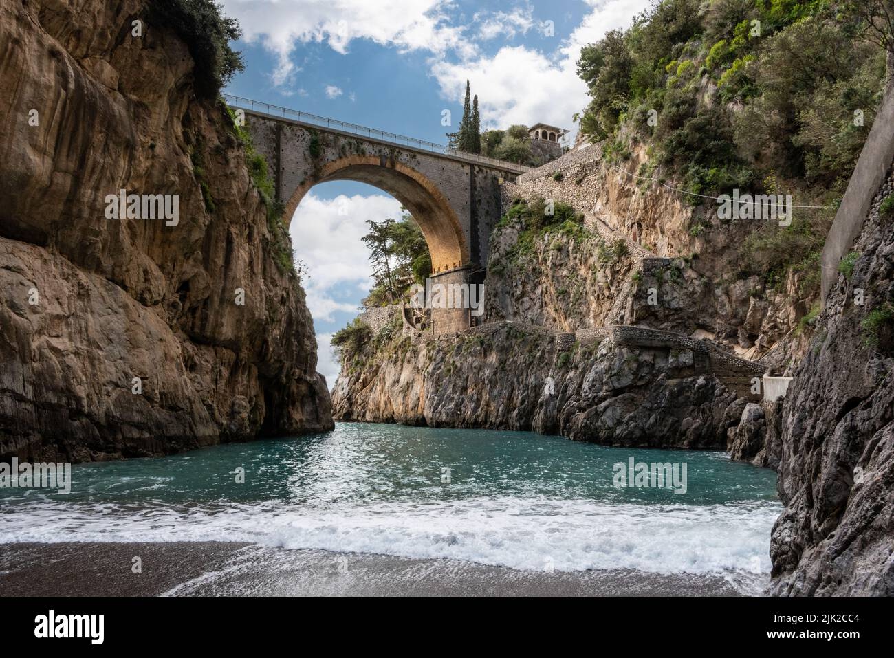 Scenic arch bridge at the Fjord of Fury, Amalfi Coast of Southern Italy ...