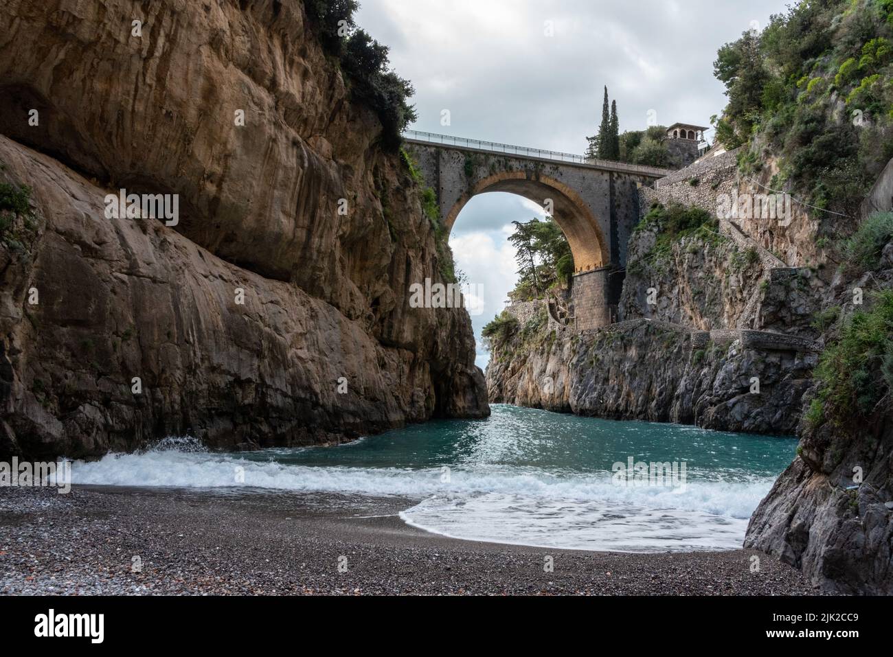 Scenic arch bridge at the Fjord of Fury, Amalfi Coast of Southern Italy ...