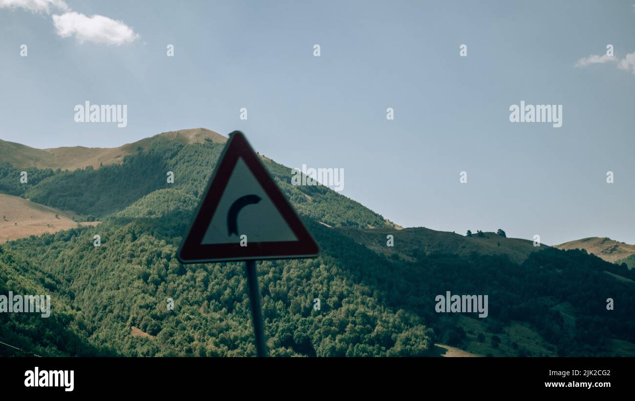 Warning signal in mountainous terrain Stock Photo - Alamy
