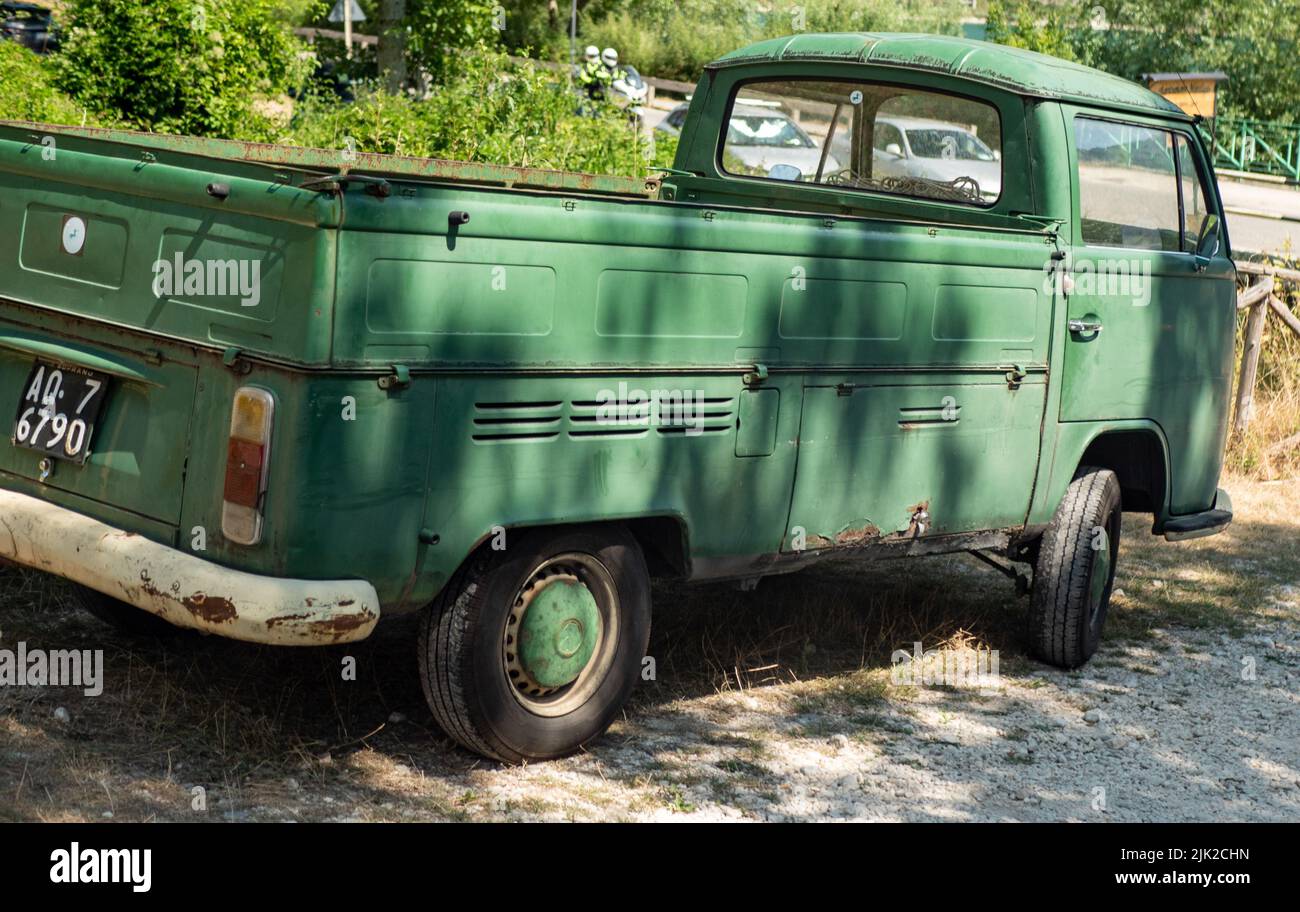 a 1968 Volkswagen T2 pickup was parked on the side of the road Stock ...