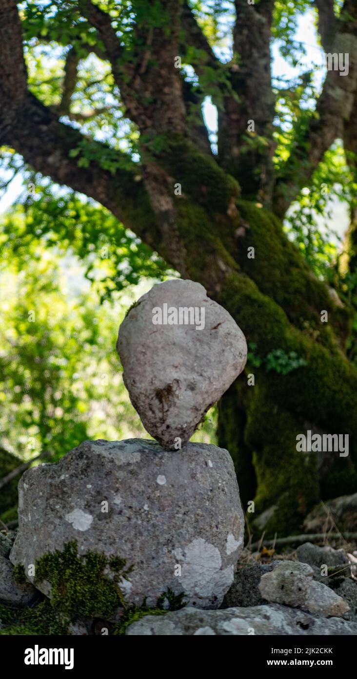 stone pyramid with white wallpaper, on the background of nature Stock ...