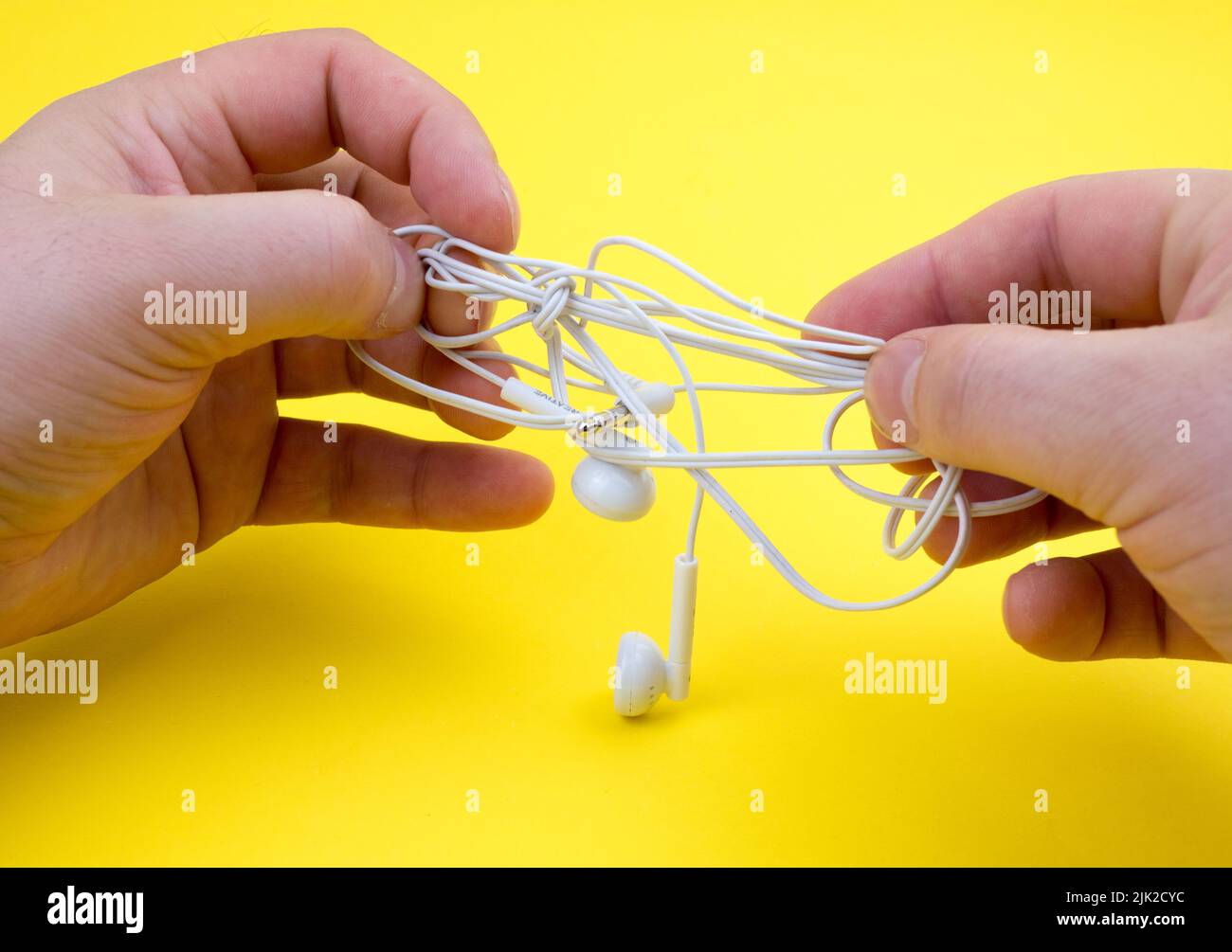 Untangling headphones hi-res stock photography and images - Alamy