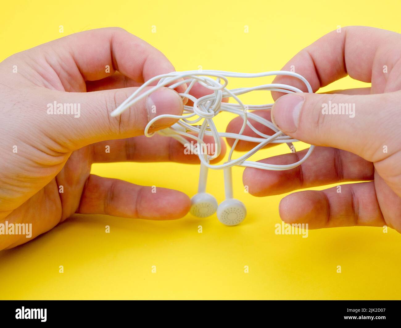 Untangling headphones hi-res stock photography and images - Alamy