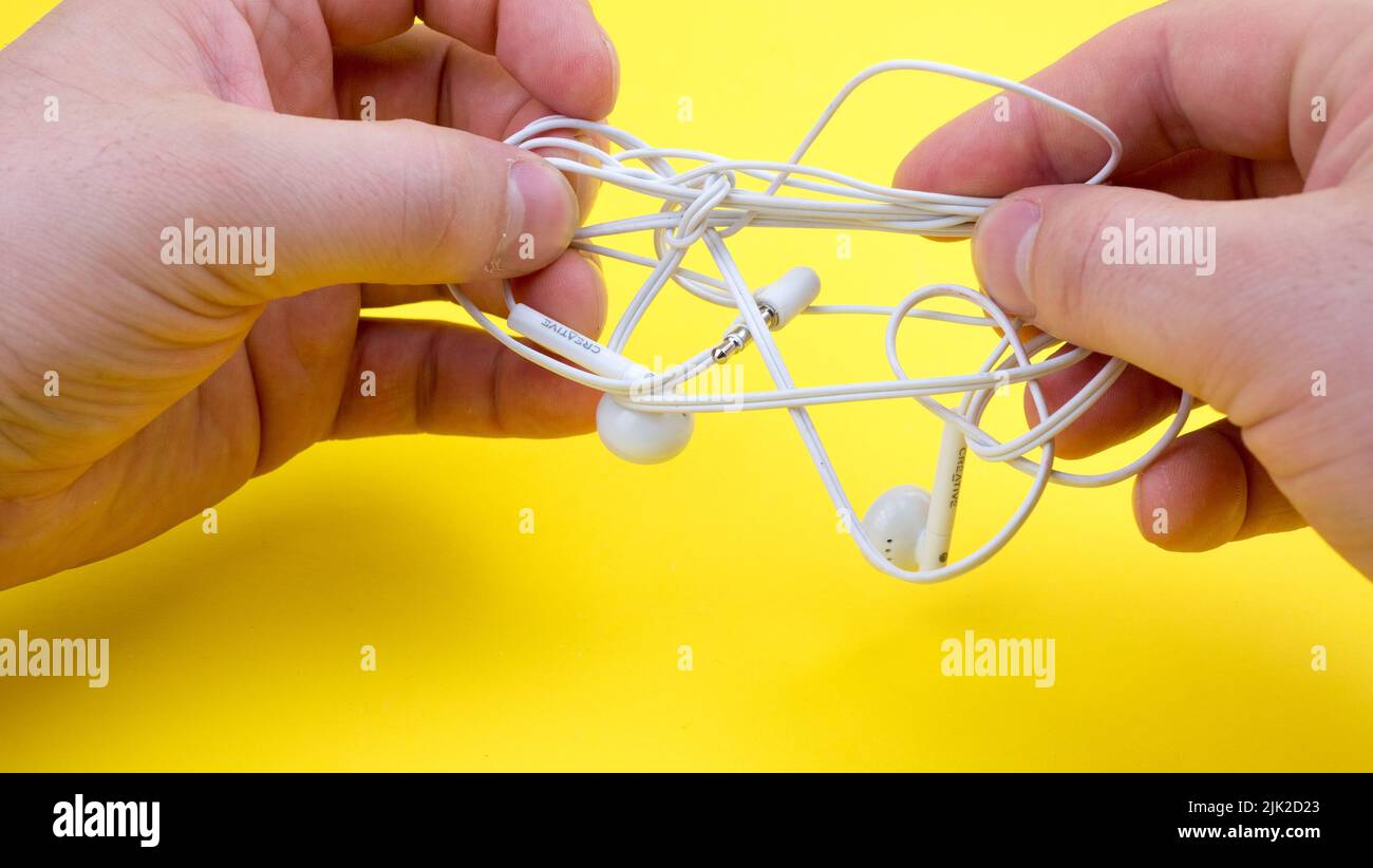 Untangling headphones hi-res stock photography and images - Alamy