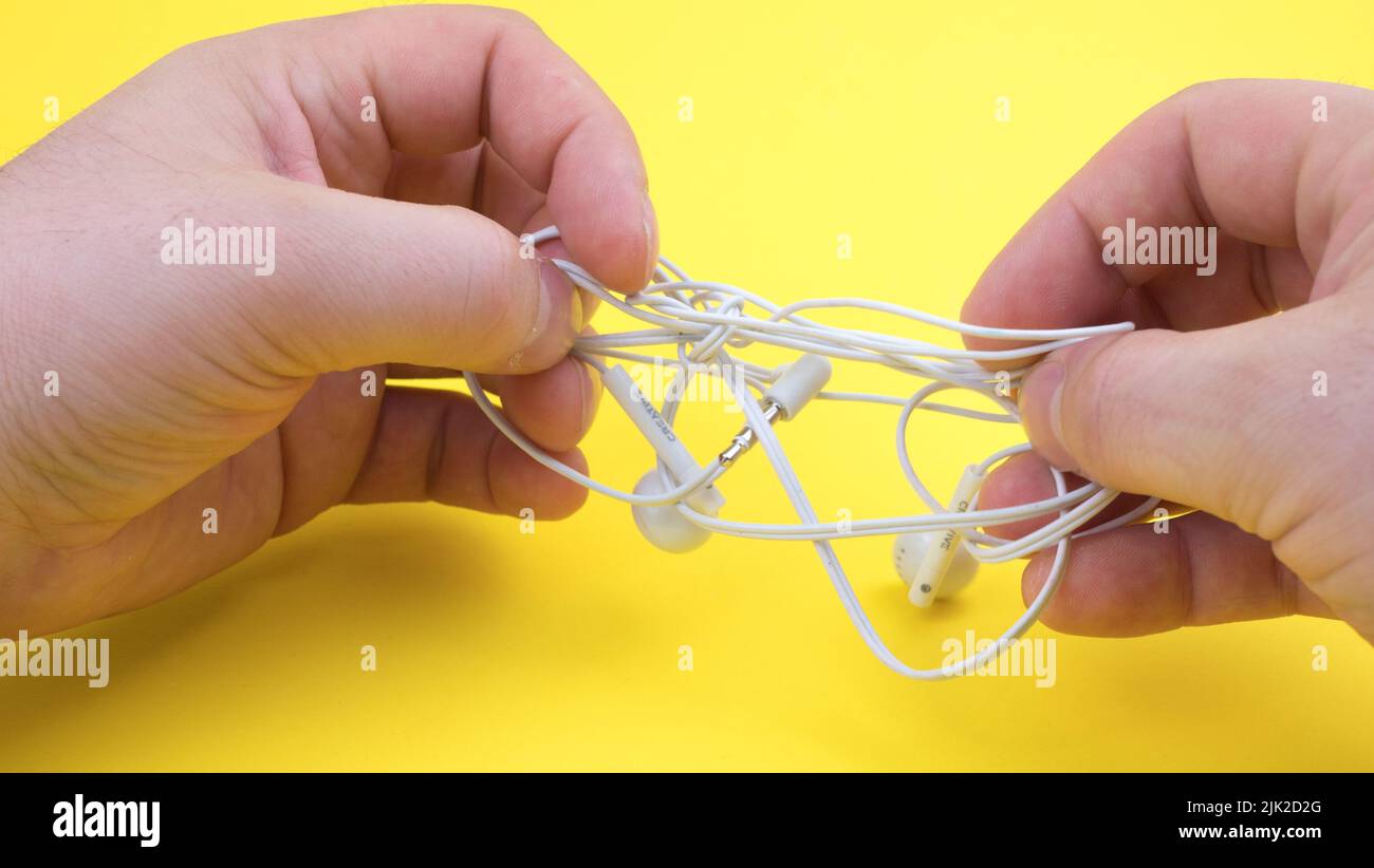 Untangling headphones hi-res stock photography and images - Alamy