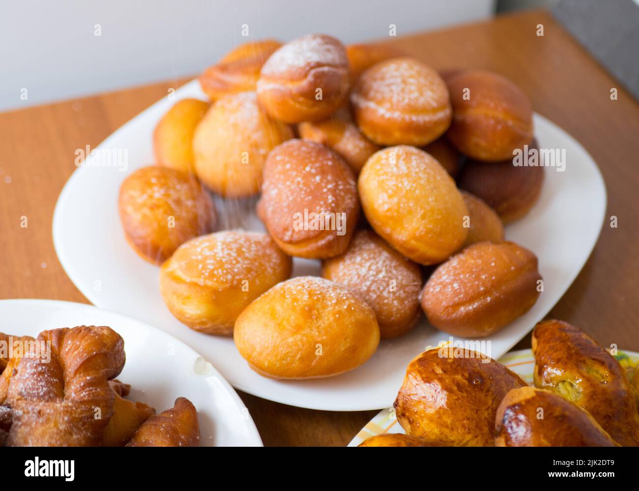 Delicious sweet donuts on a plate. close up. Traditional Jewish sweet ...