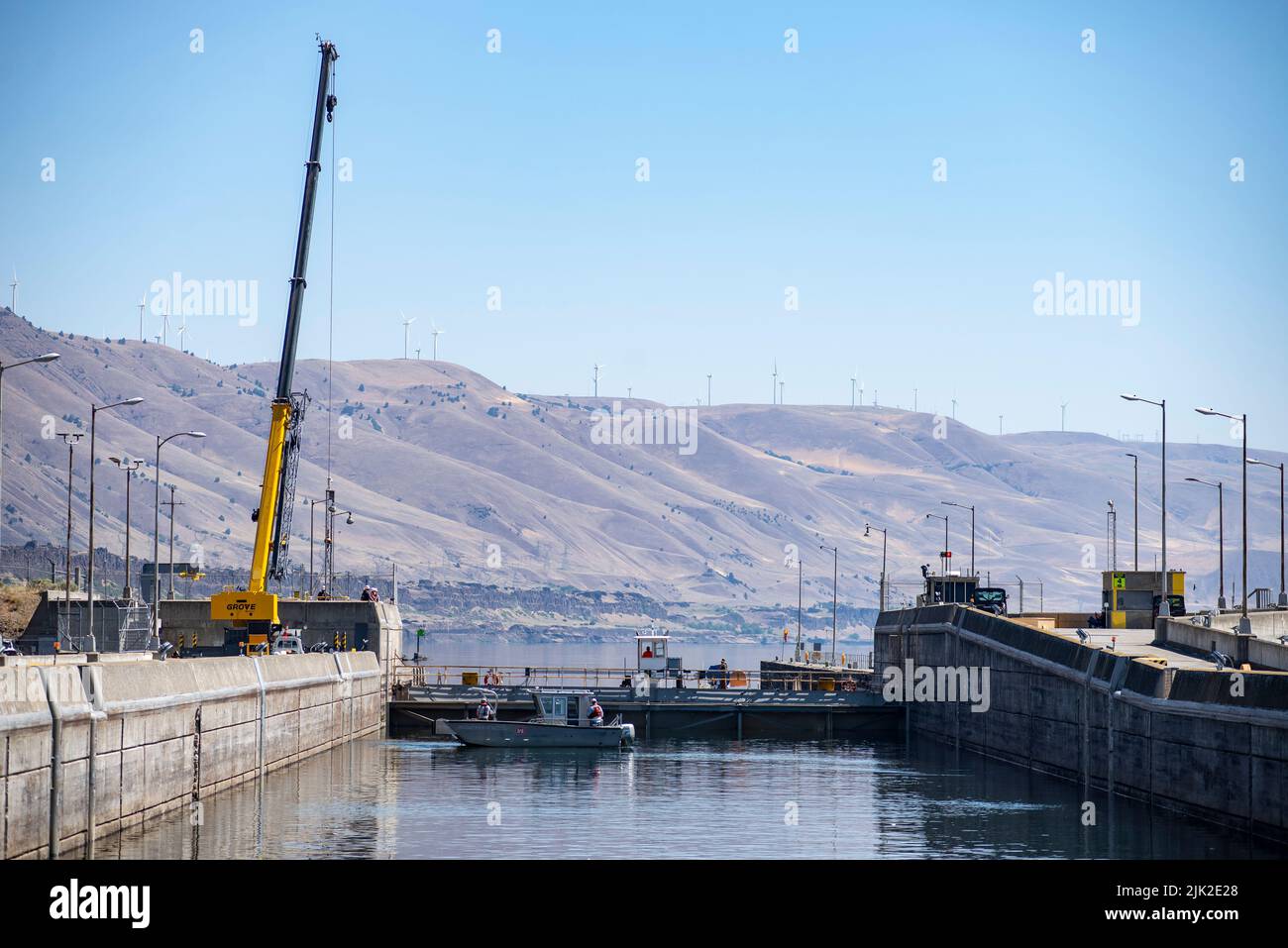 A crew of maintenance workers and natural resource specialists with the ...