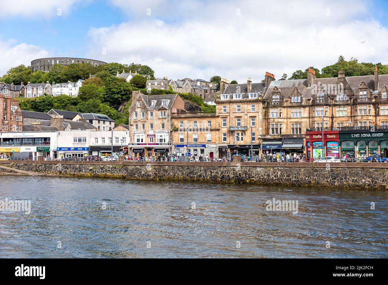 Oban town centre on sunny summers day, high street shops and tourists ...