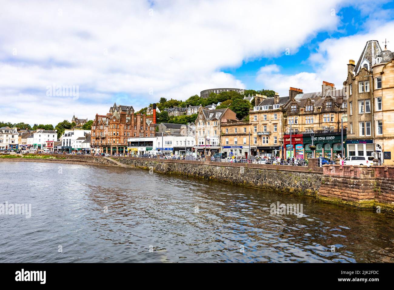 Oban town centre on sunny summers day, high street shops and tourists ...
