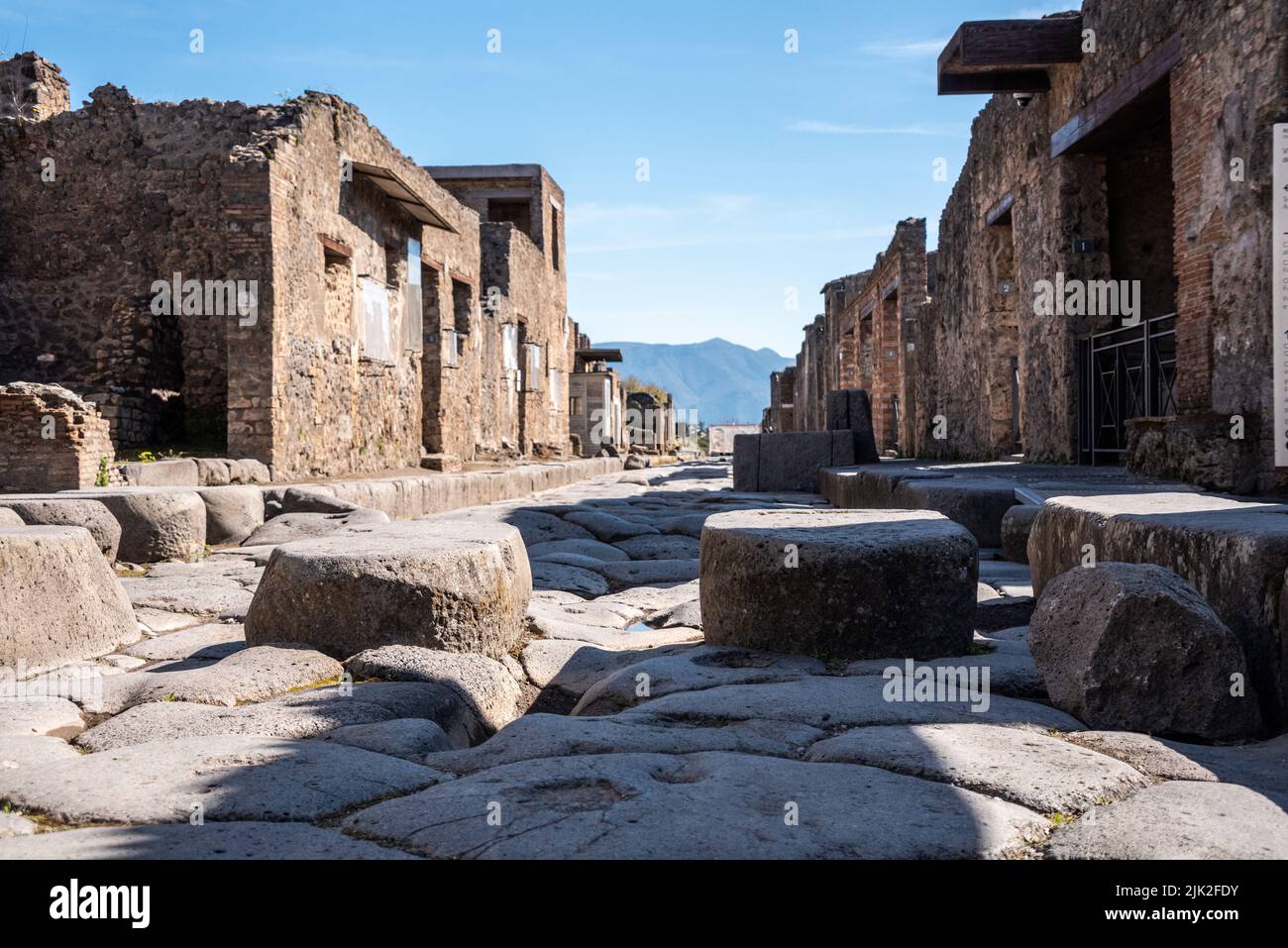 A crosswalk of a typical Roman road in the ancient city of Pompeii ...