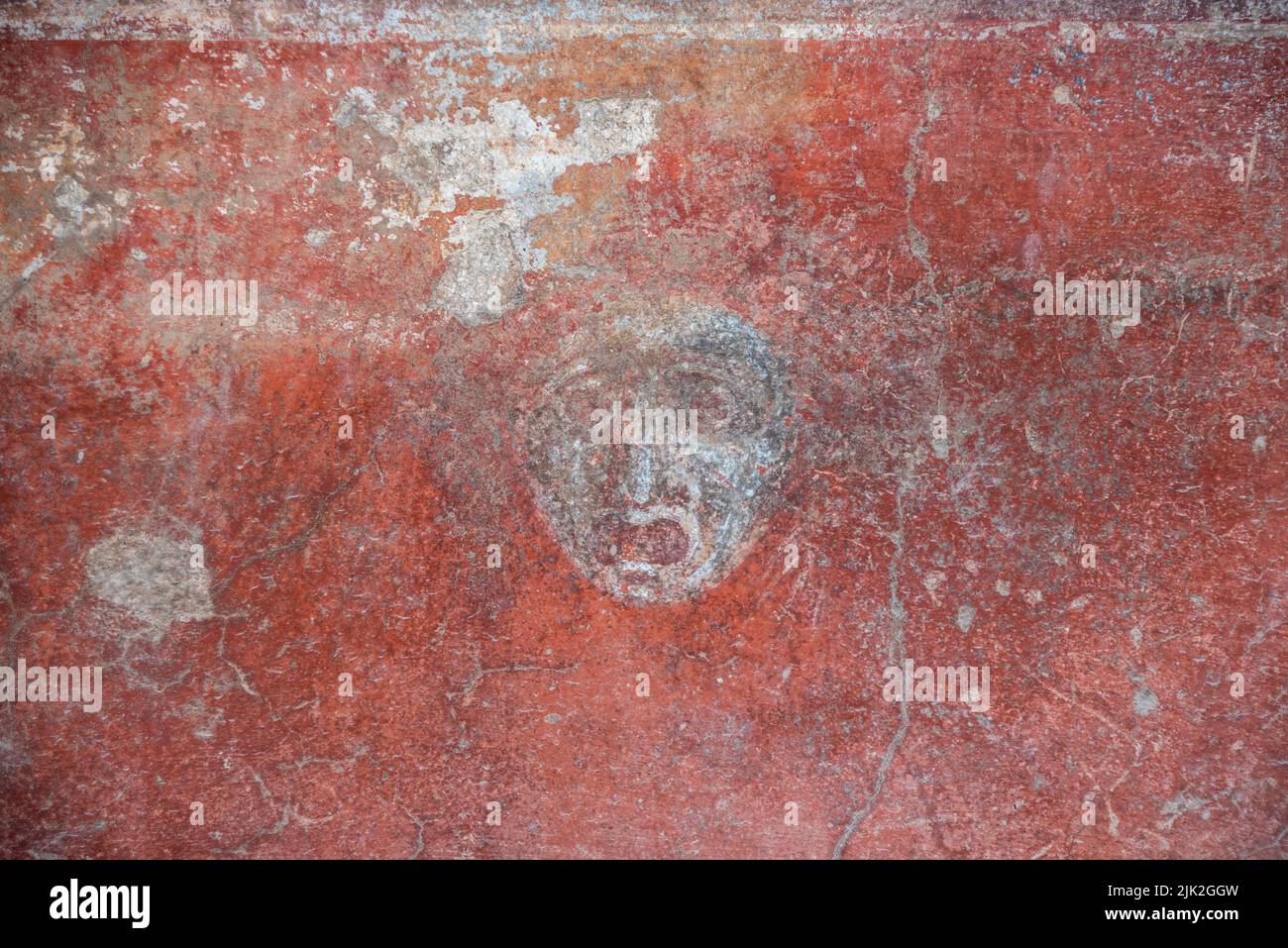 Scenic mask in a fresco of an ancient Roman villa in Pompeii, Southern ...