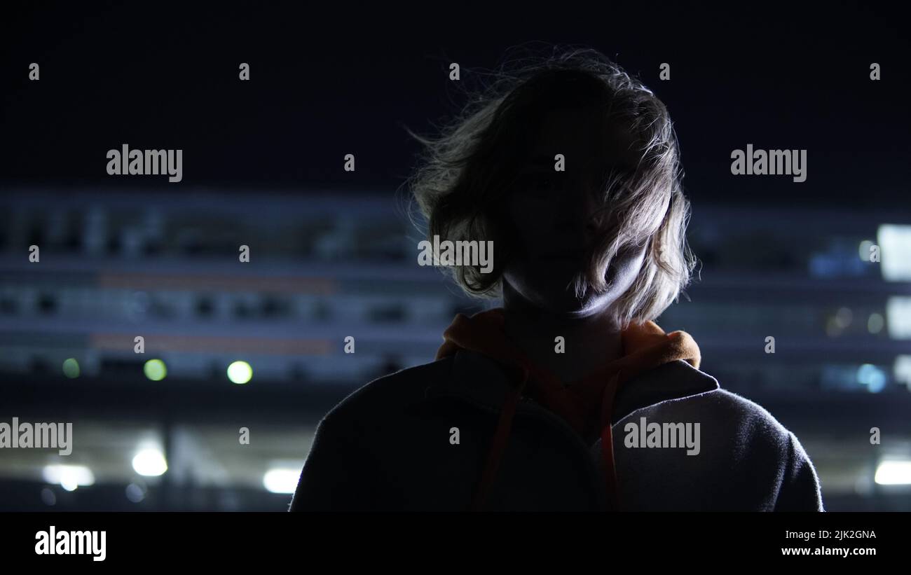 Girl in shadow hi-res stock photography and images - Alamy