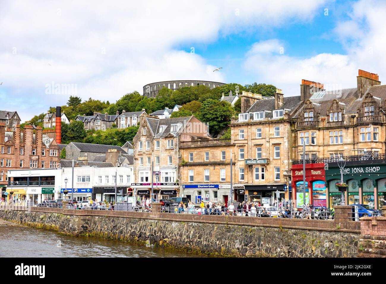 Oban town centre on sunny summers day, high street shops and tourists ...