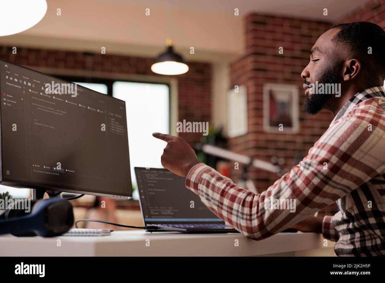 Web Developer Writing Program Code And Html Data Base On New User Interface Male Freelancer
