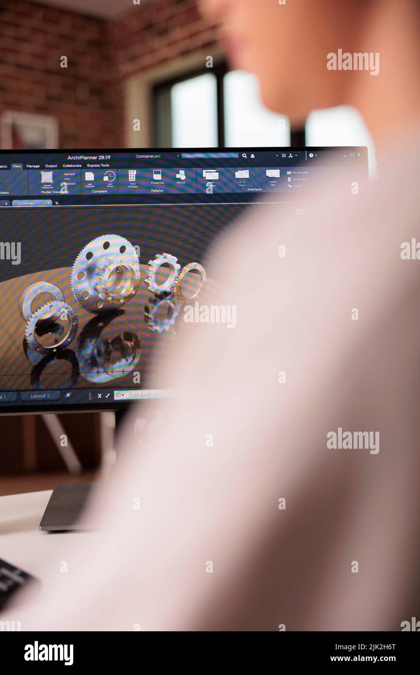 Female cad engineer manufacturing industrial product, woring with ...