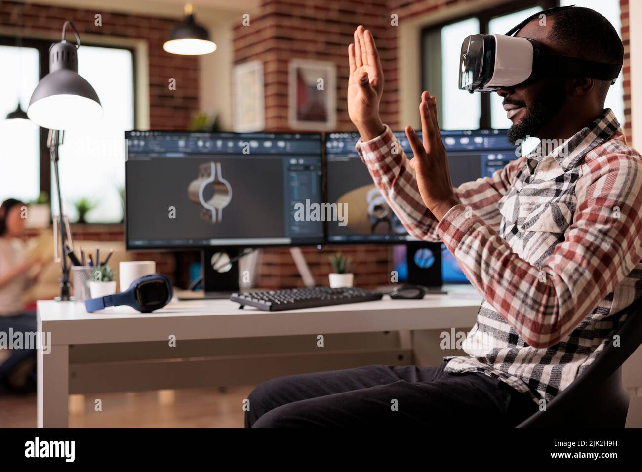 Technician with vr glasses developing industrial product on ...