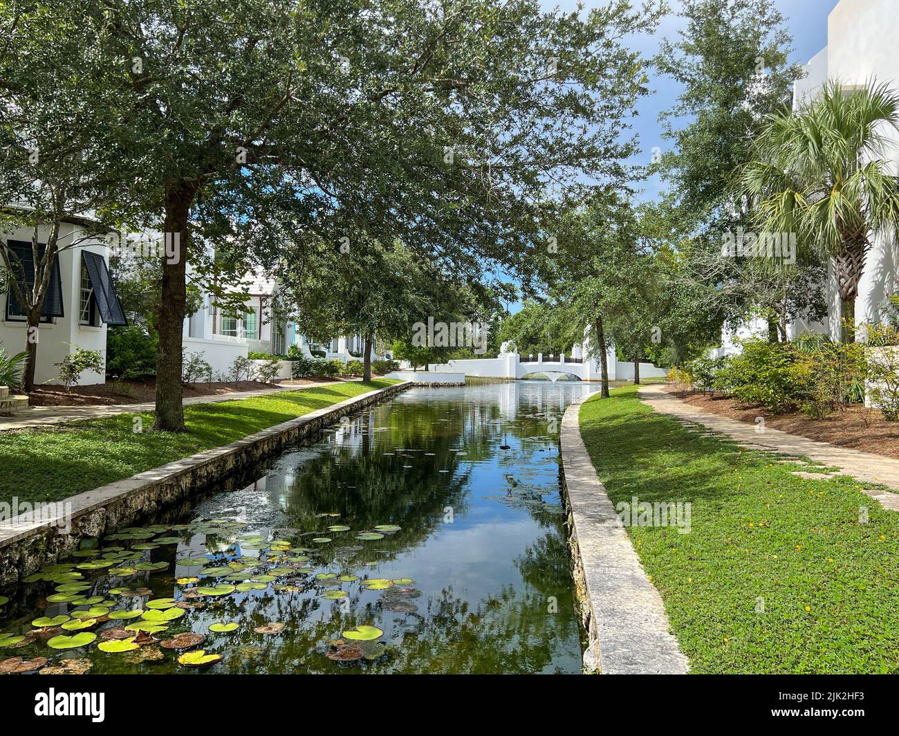 Alys Beach, FL USA - July 26, 2022: A walking path with water feature ...
