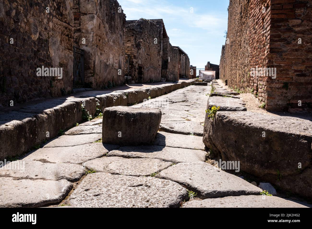 A crosswalk of a typical Roman road in the ancient city of Pompeii ...