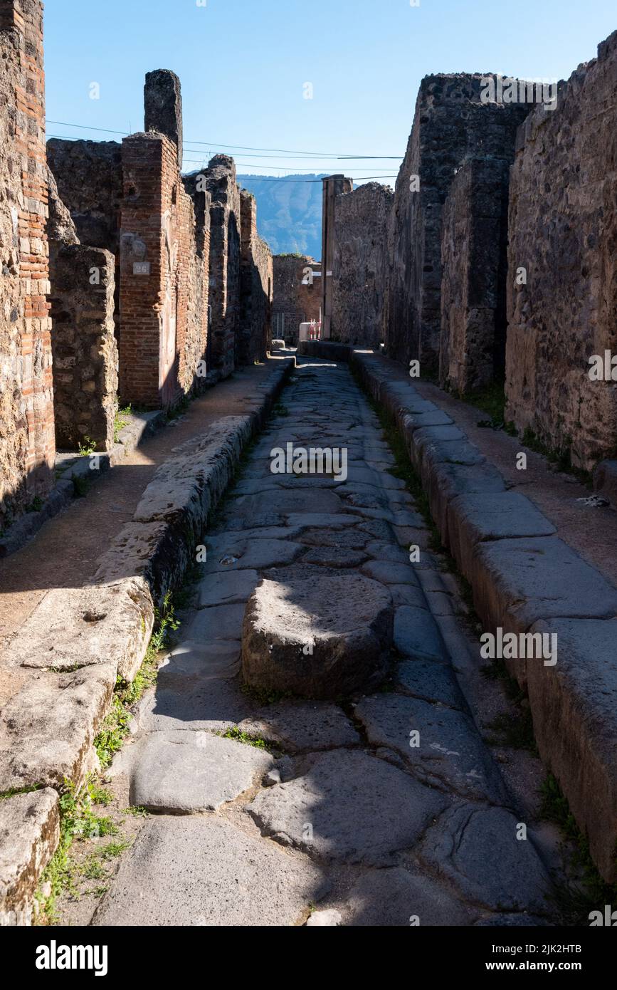 A crosswalk of a typical Roman road in the ancient city of Pompeii ...