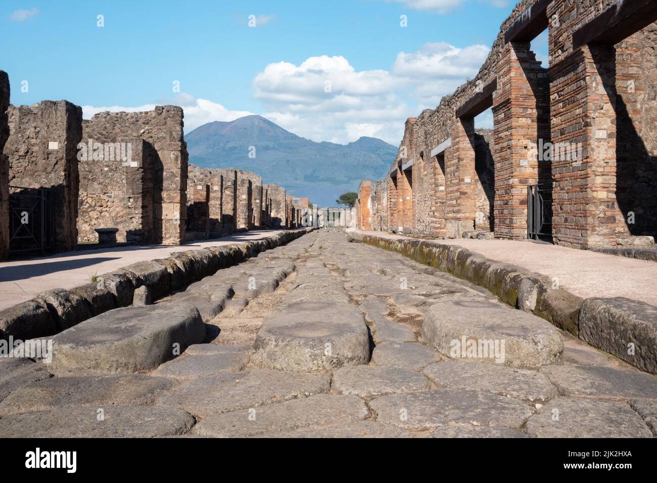 A crosswalk of a typical Roman road in the ancient city of Pompeii ...