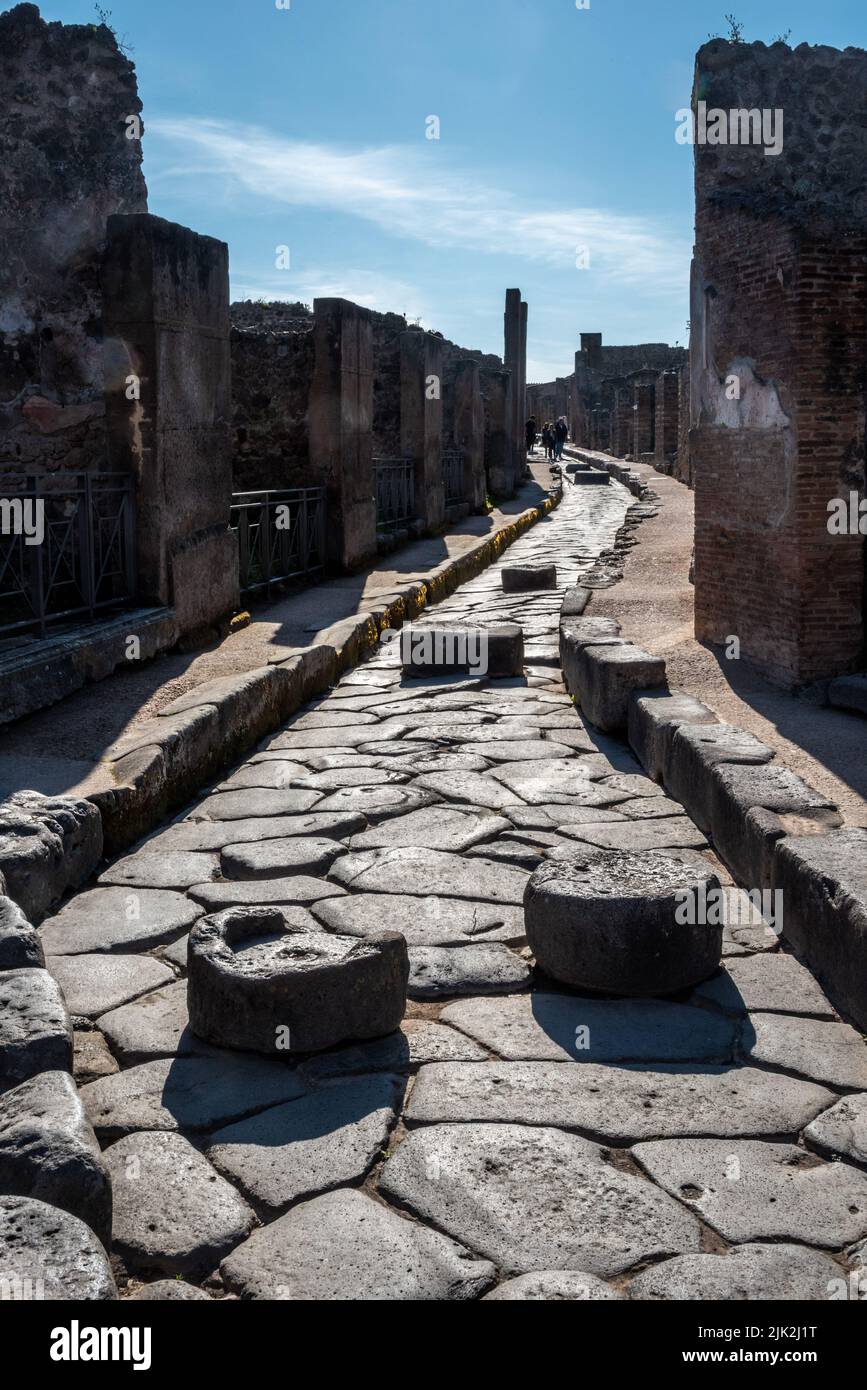 A crosswalk of a typical Roman road in the ancient city of Pompeii ...