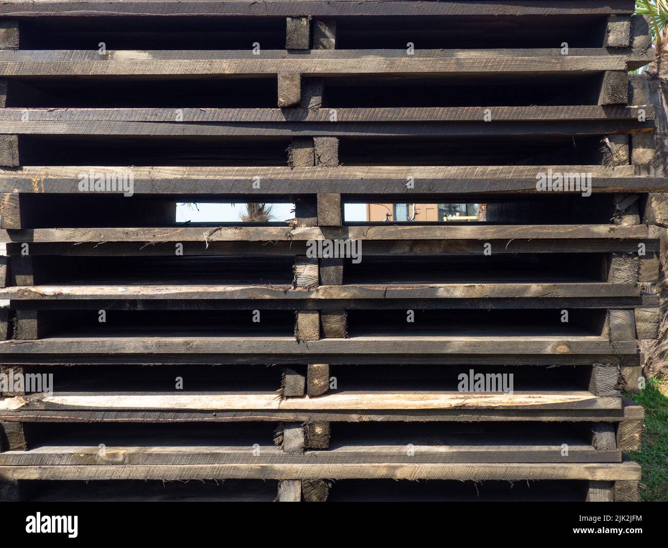 Many pallets painted in black. Lots of broken boards. Industrial Zone ...