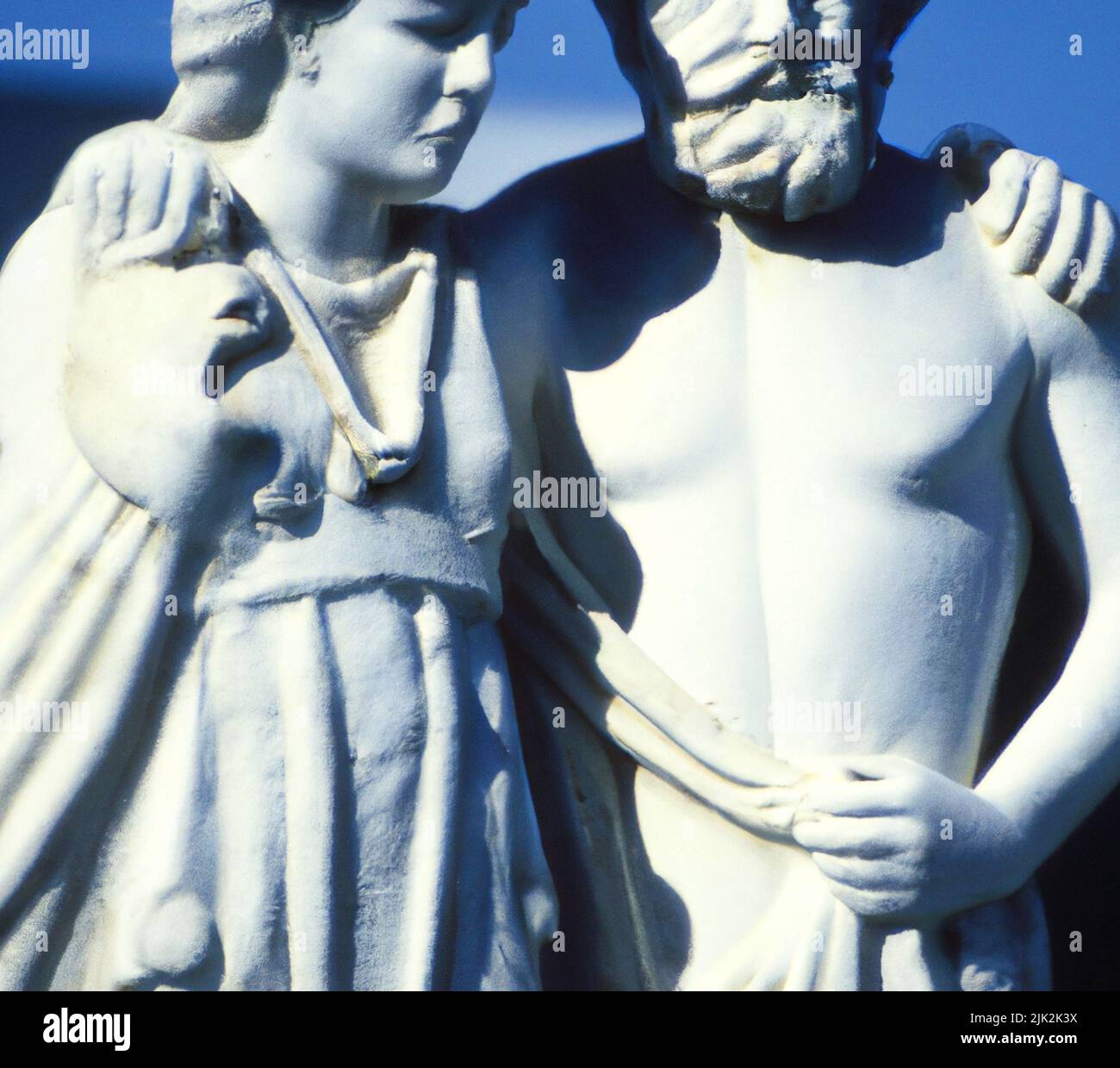 A statue of a grieving person being comforted by another Stock Photo ...
