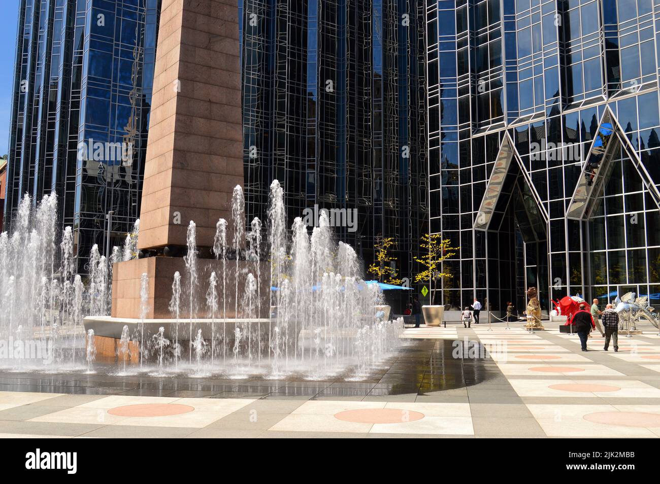 Fountains splash in PPG Plaza in Pittsburgh, Pennsylvania while the ...