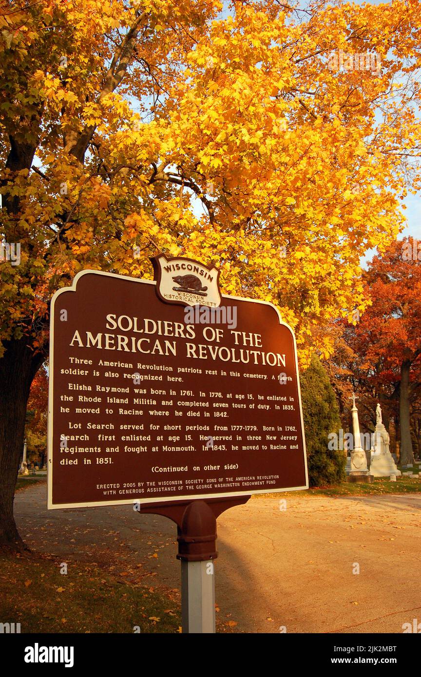 Sign buried in tree hi-res stock photography and images - Alamy