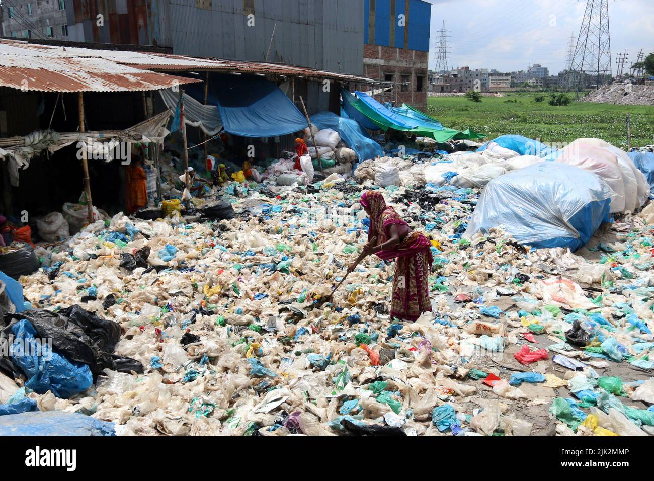 Dhaka, Bangladesh. 29th July, 2022. Workers collect polythene and ...