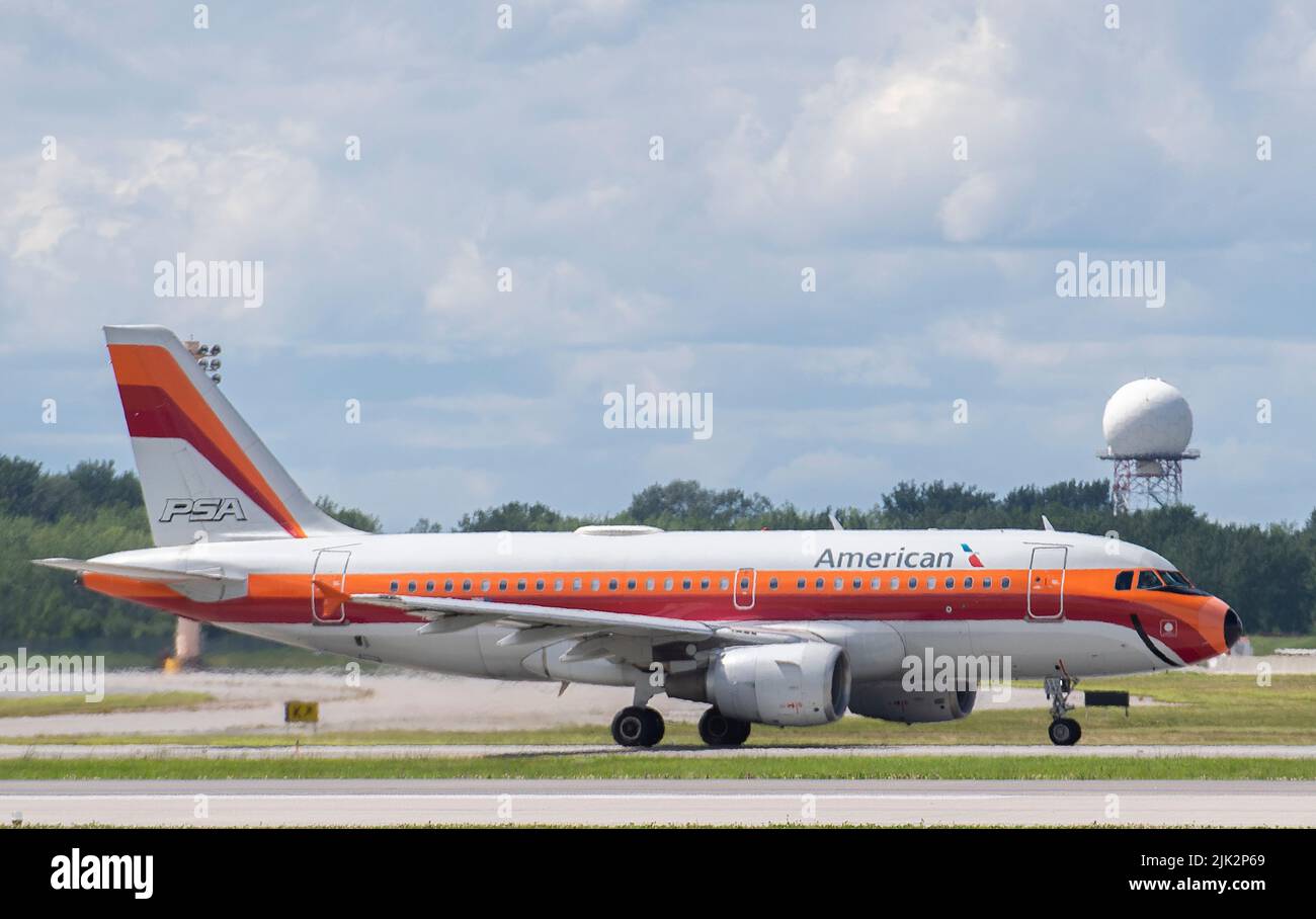 A PSA American Airlines jet taxis on the runway at Trudeau airport in ...