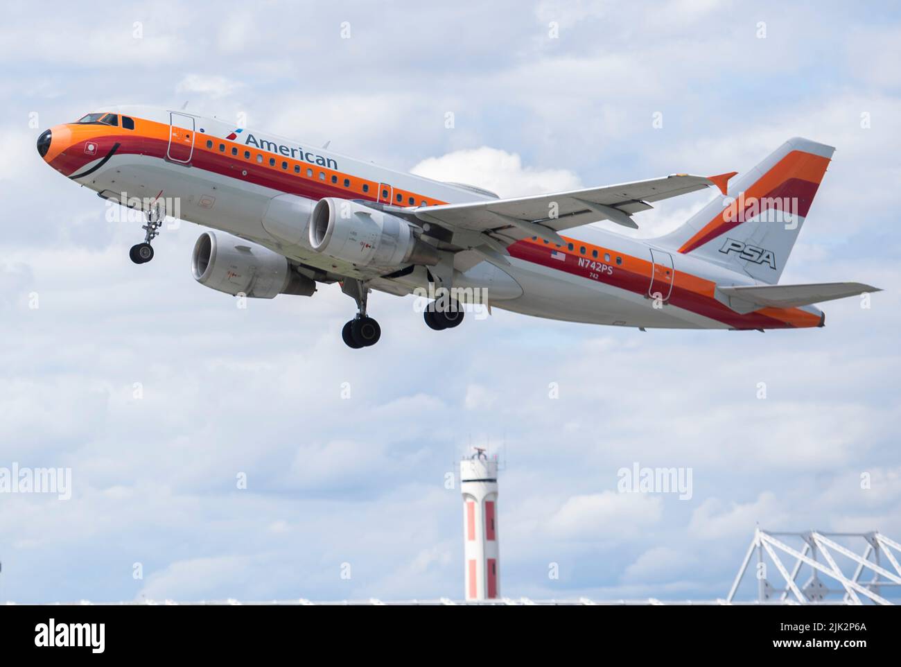 A PSA American Airlines jet takes off from Trudeau airport in Montreal ...