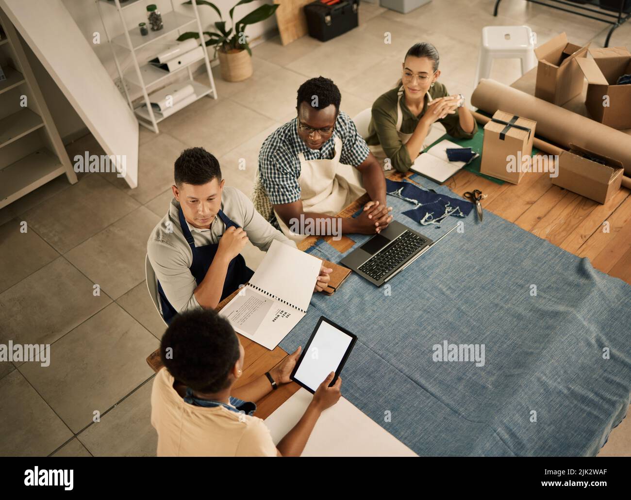 Fashion designers, colleagues and creatives meeting to discuss and ...