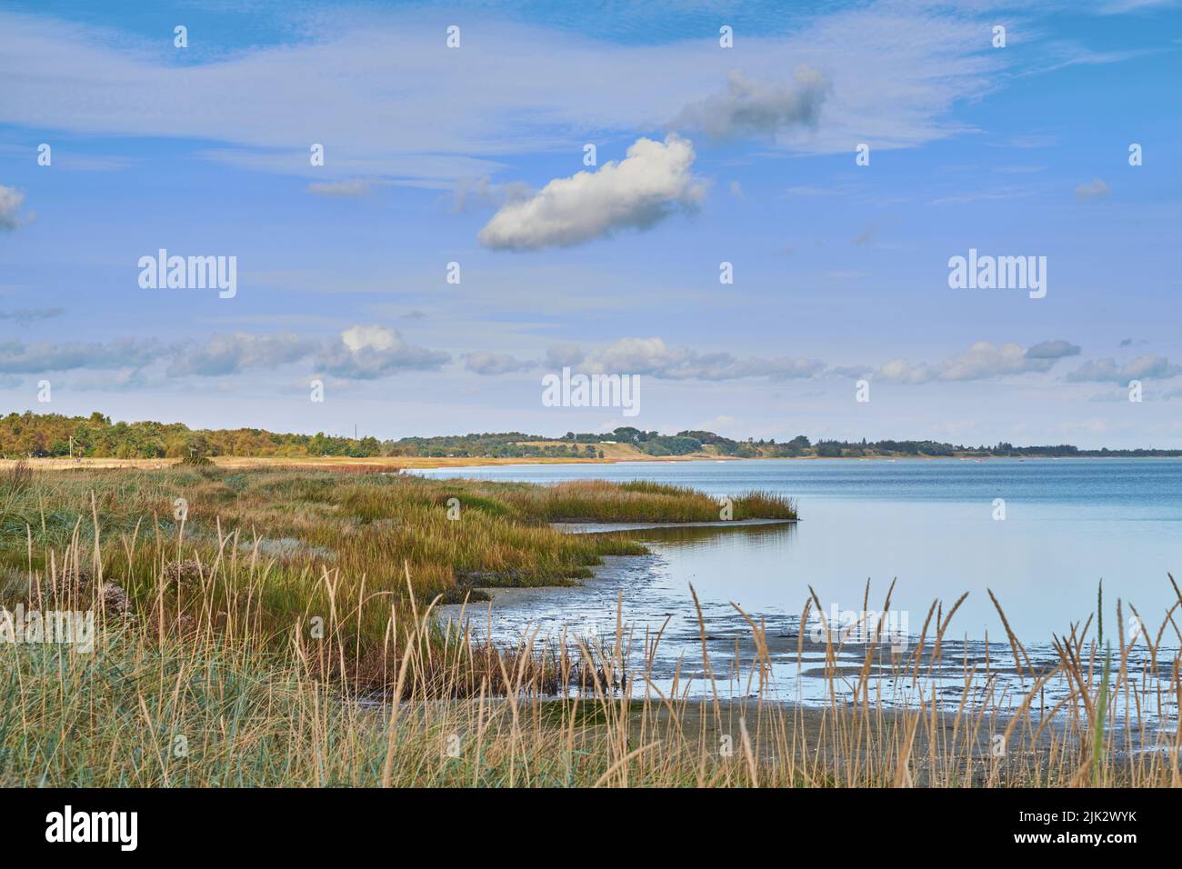 Landscape of sea, lake or coast against sky background with clouds and ...