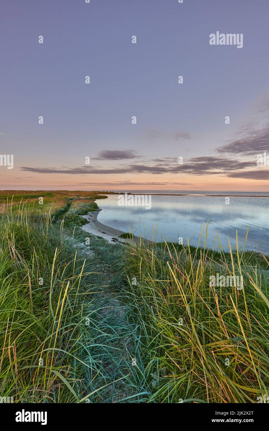 Landscape of sea, lake or lagoon against sunset sky background with ...