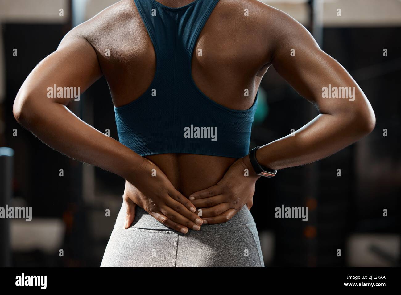 If youre gonna lift, get yourself a back brace. Rearview shot of an ...