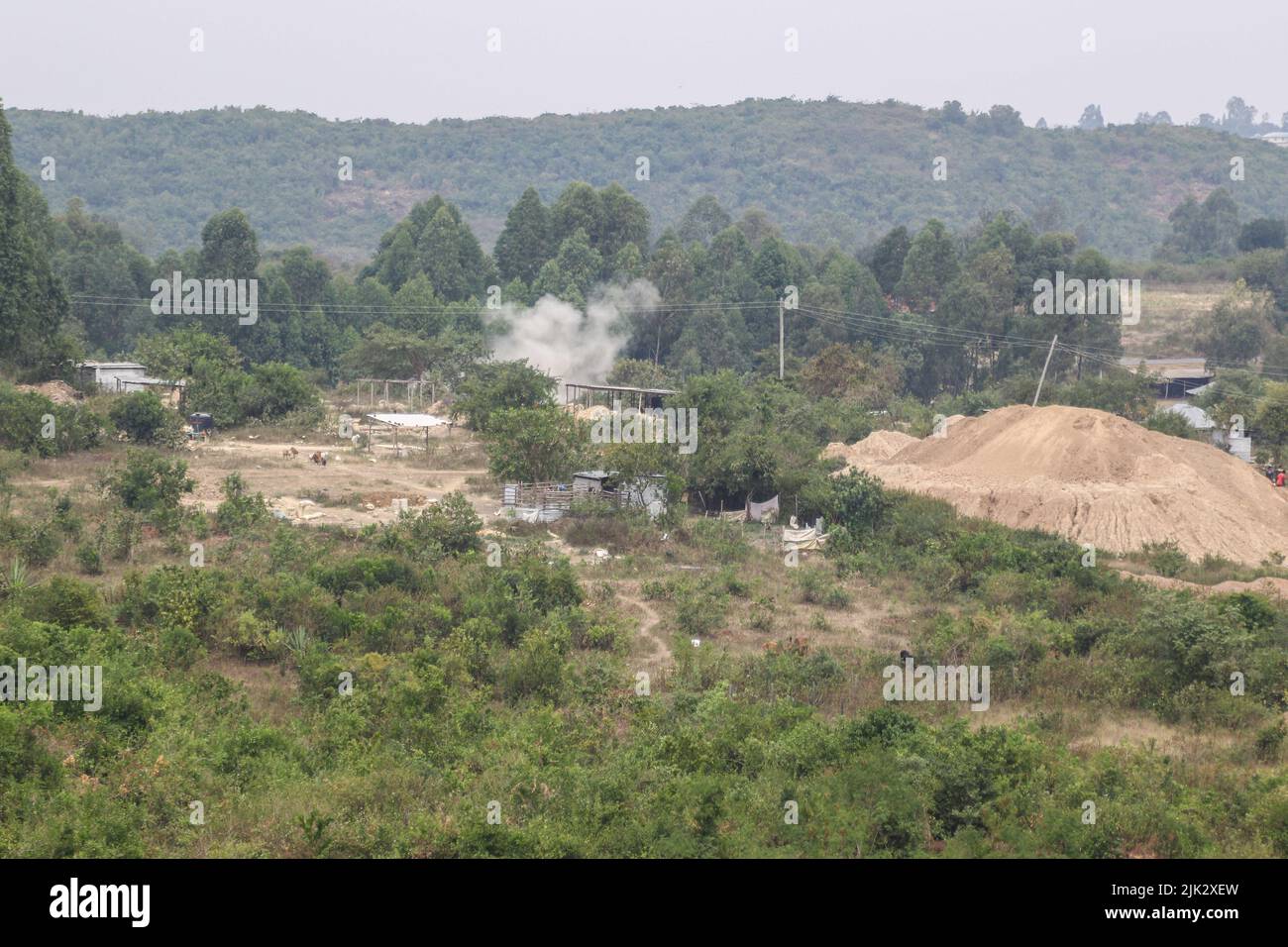 A general view of a gold mine at Mikei Village. Artisanal and small ...