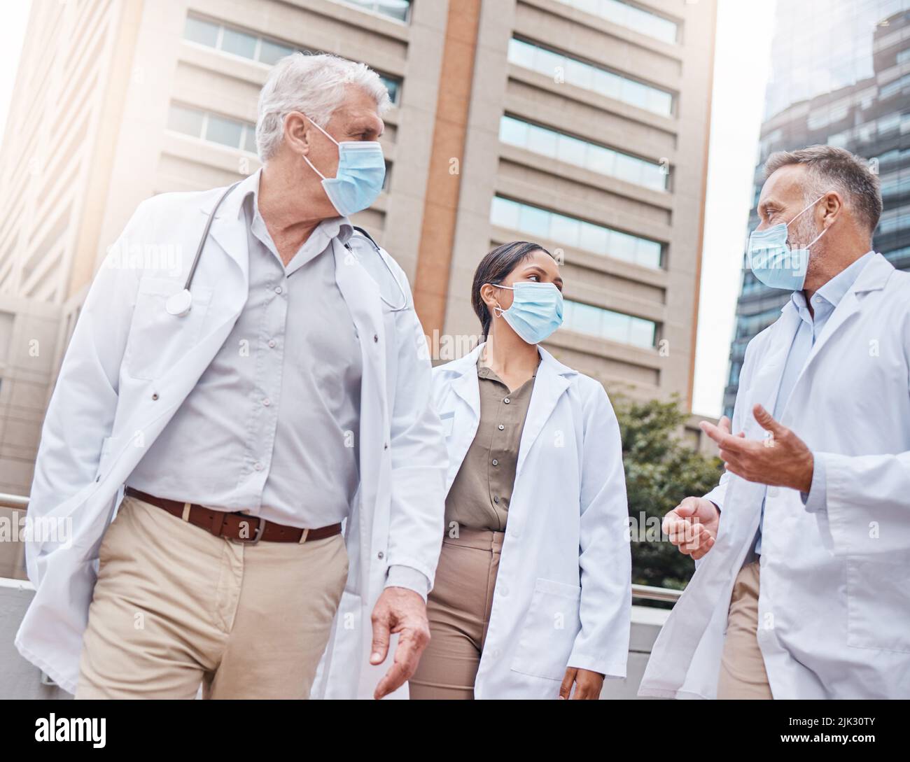 Group doctor talking hi-res stock photography and images - Alamy