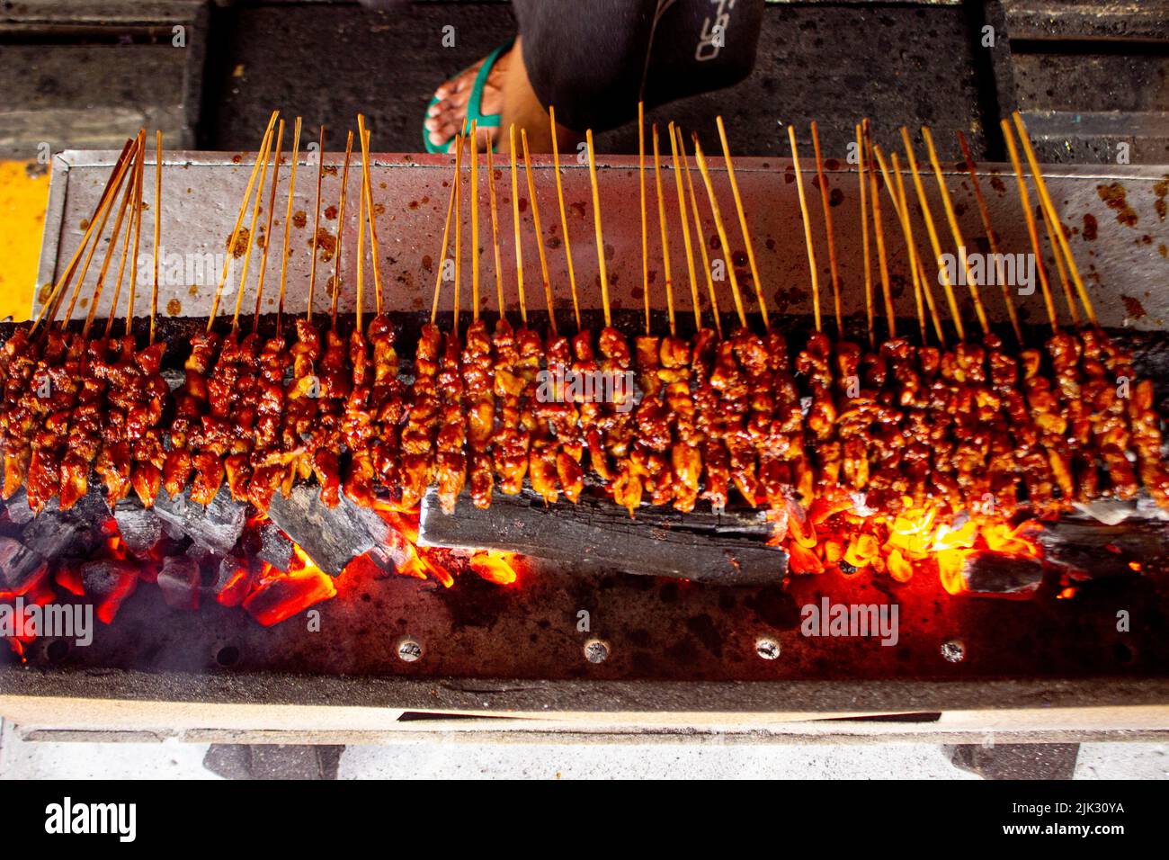 sate ayam or chicken satay , or chicken or meat satay with charcoal ...
